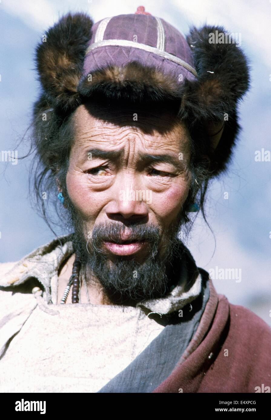 Tibetan man in a fur hat, 1969 Stock Photo - Alamy
