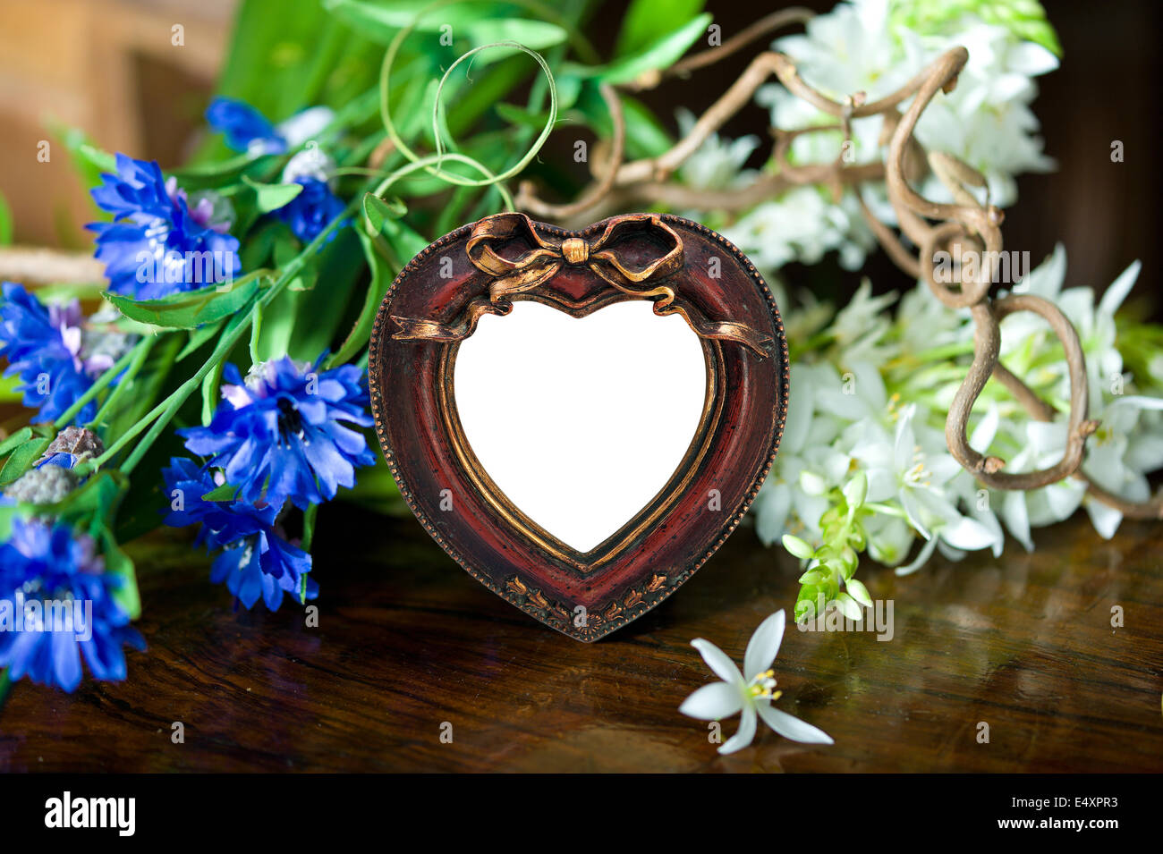 Still life with antique ornate frame Stock Photo - Alamy
