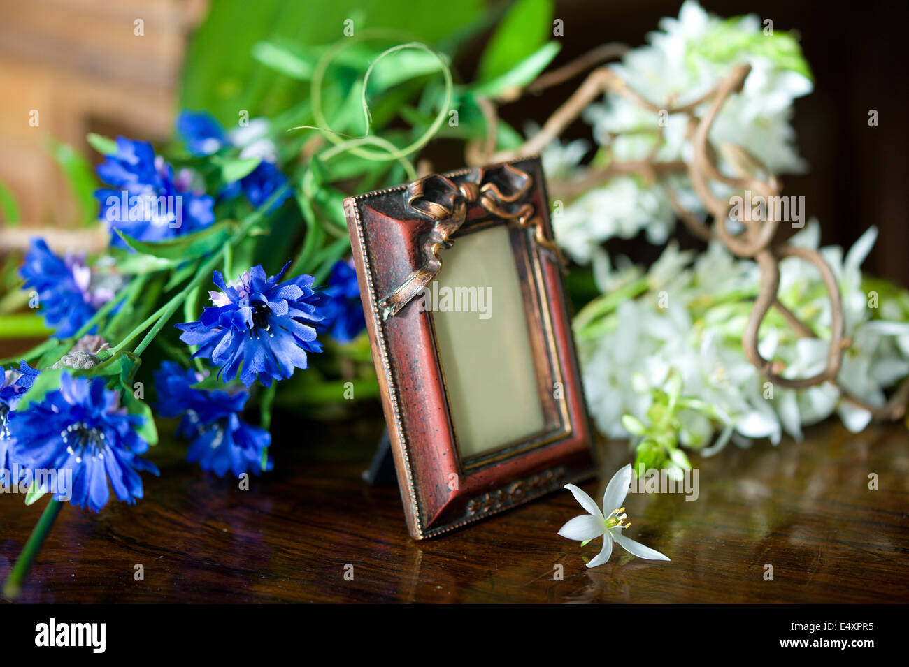 Still life with antique ornate frame Stock Photo - Alamy