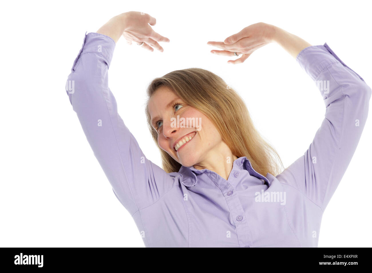 Woman stretching arms above head hi-res stock photography and images ...