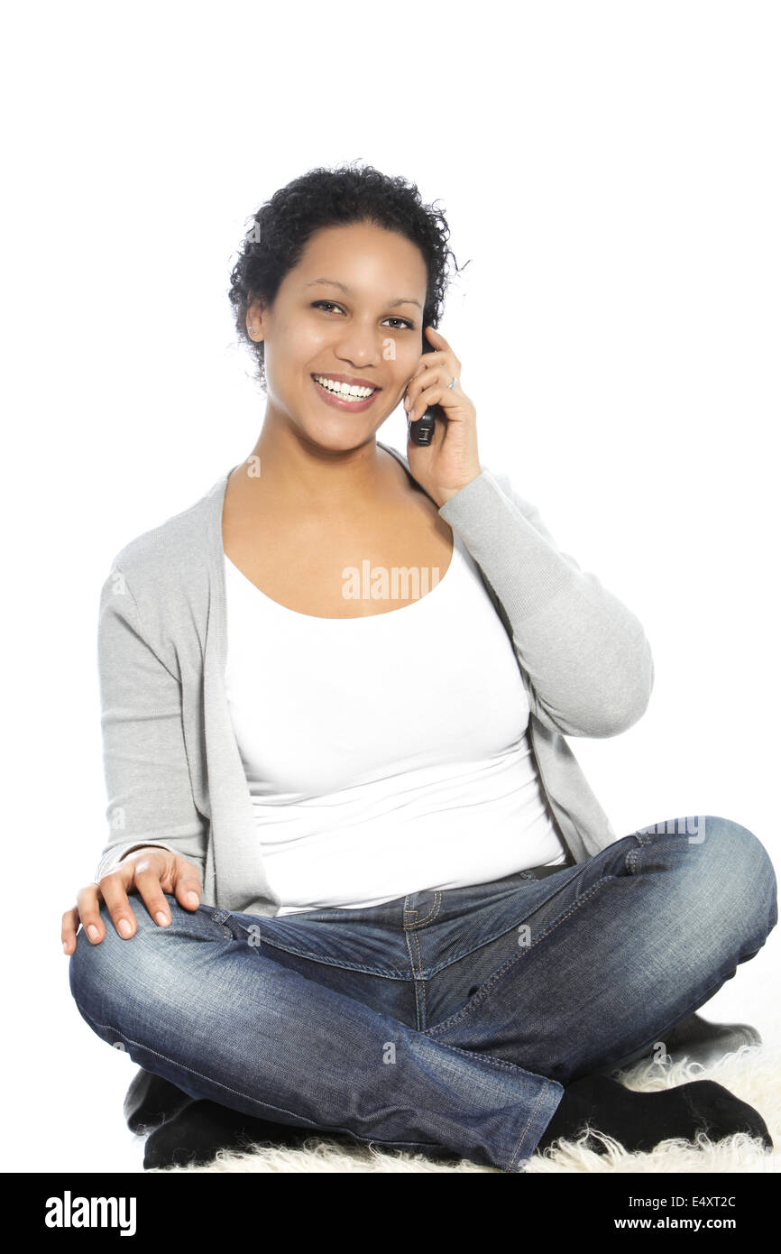 Attractive african woman sitting on hi-res stock photography and images ...