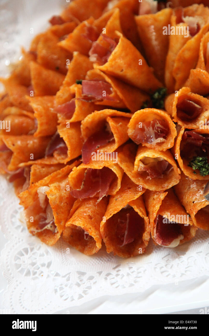Close up of a plate of brandy snap cones Stock Photo - Alamy
