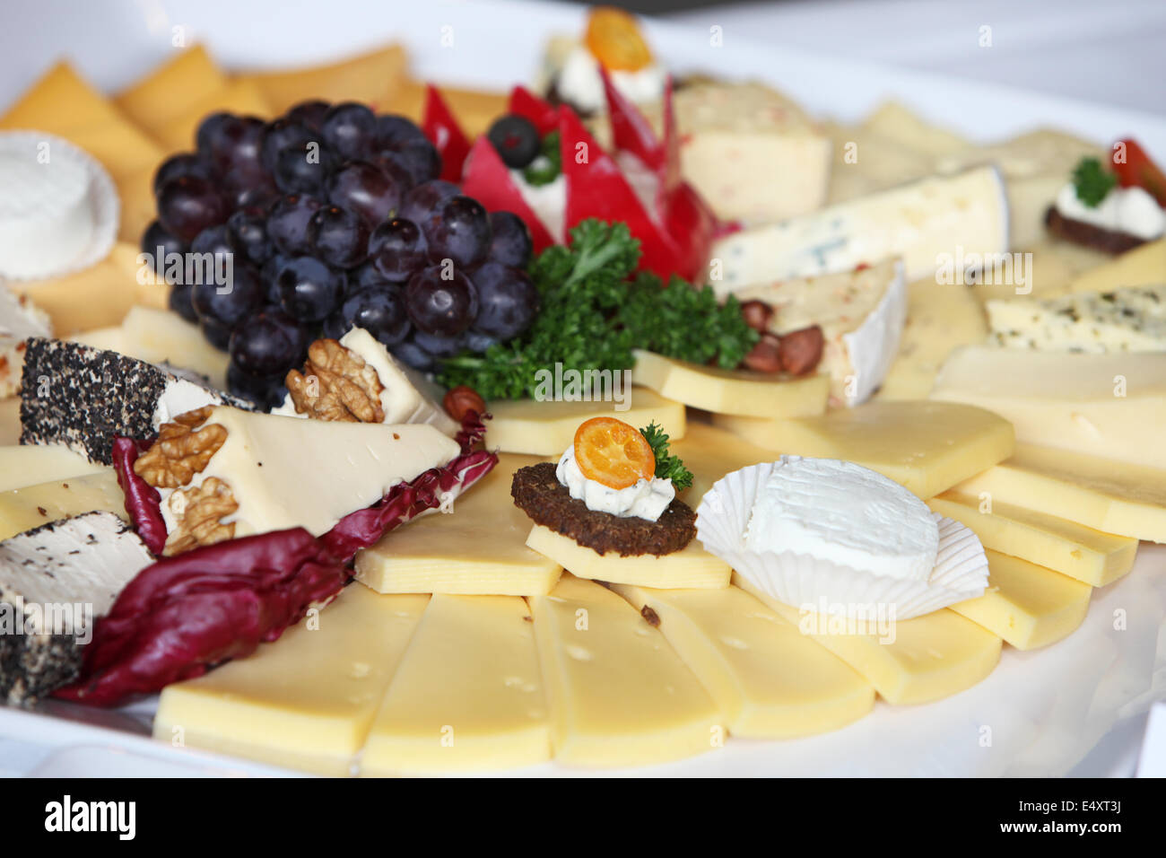 Cheese platter on a buffet Stock Photo - Alamy