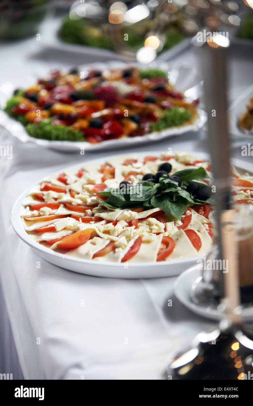 Platter of mozzarella cheese and tomato Stock Photo - Alamy