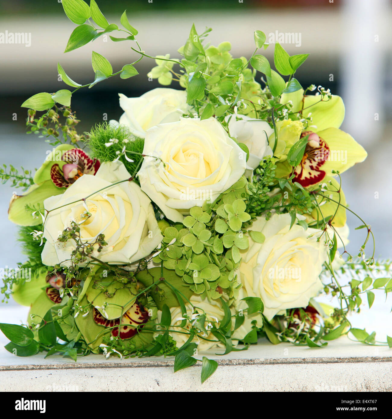 Beautiful bouquet of roses and orchids Stock Photo - Alamy