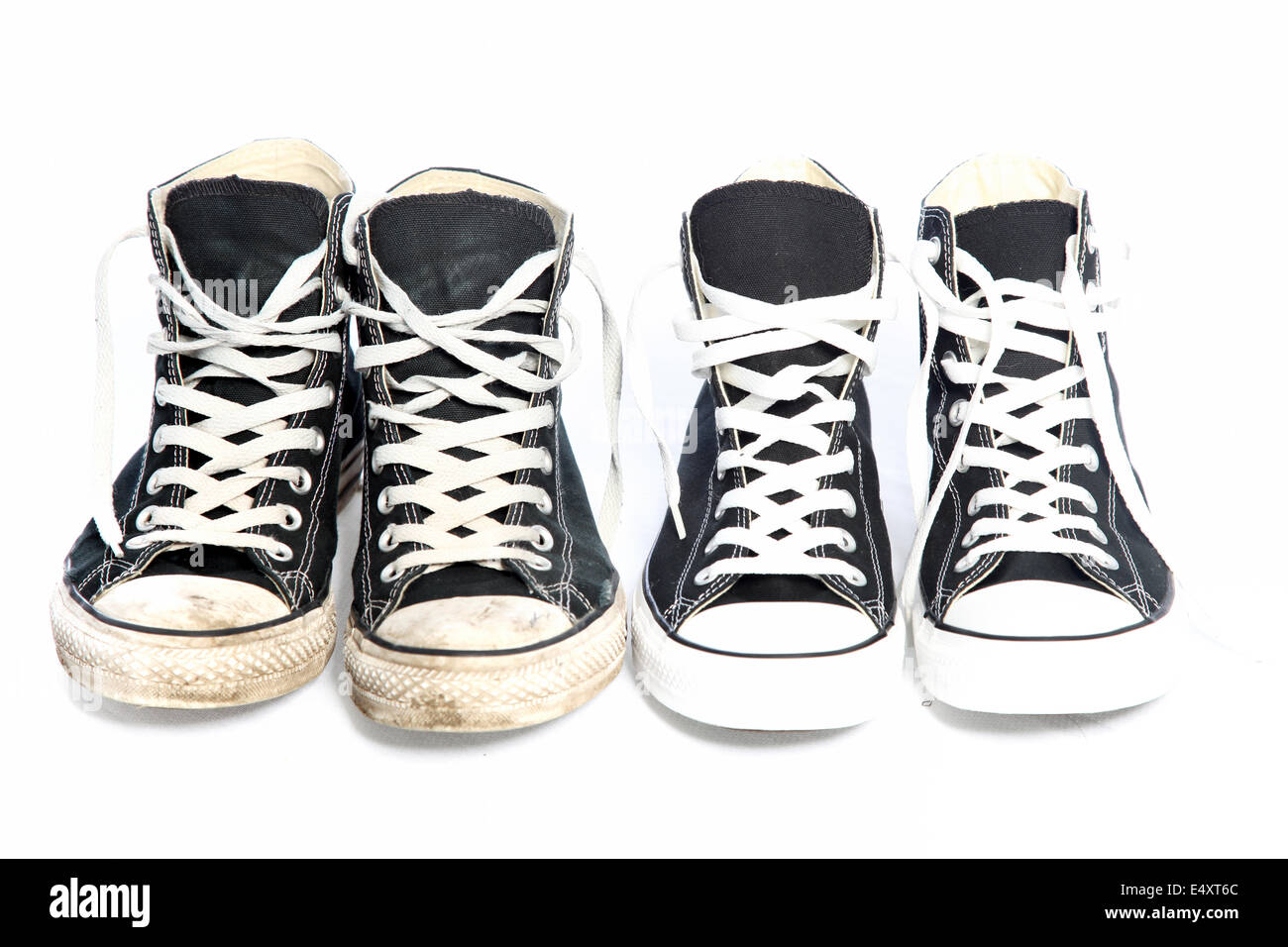 Two pairs of sneakers - one old, one new Stock Photo - Alamy