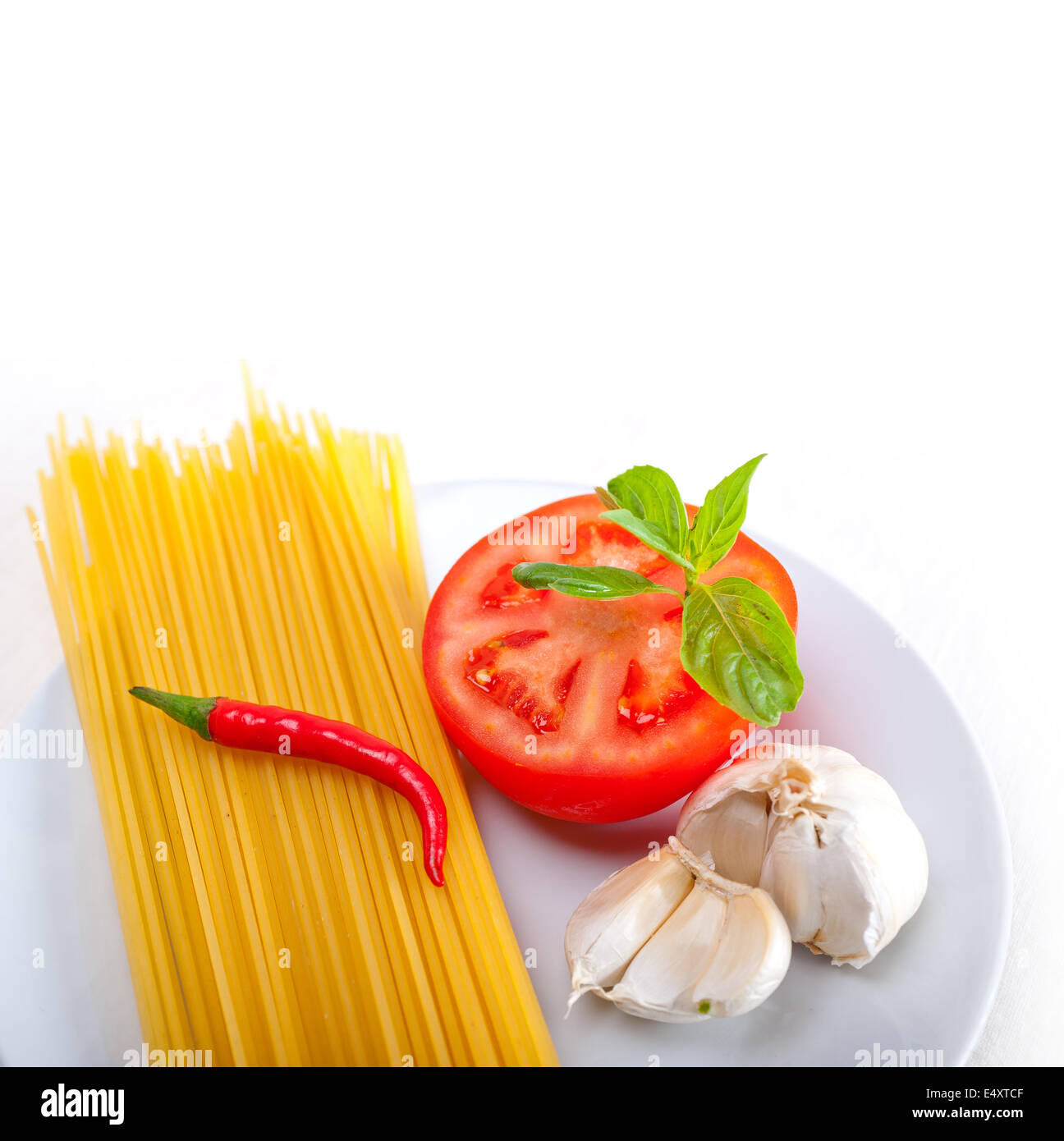 Italian spaghetti pasta tomato ingredients Stock Photo - Alamy