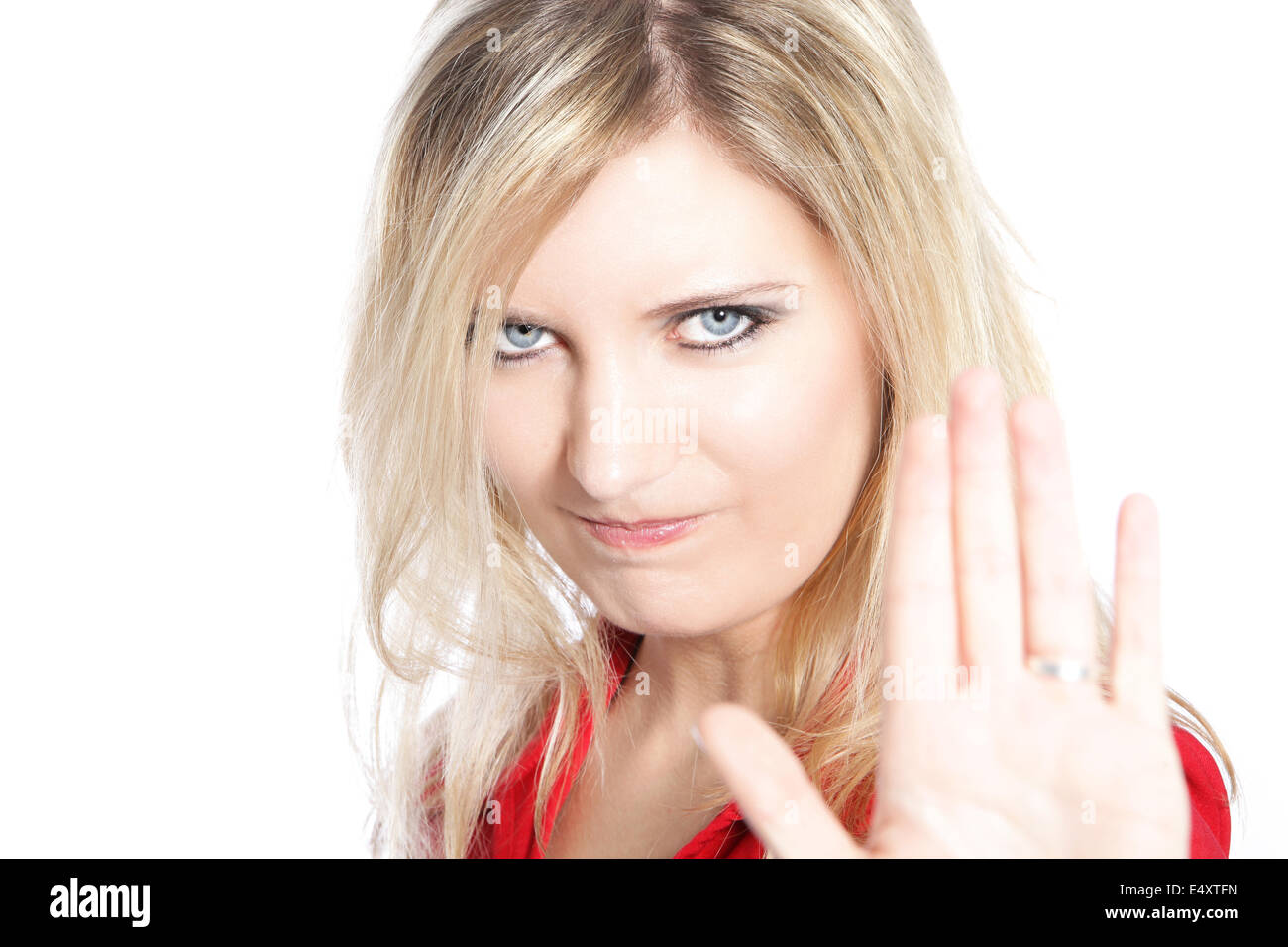 Woman making a Halt gesture Stock Photo - Alamy