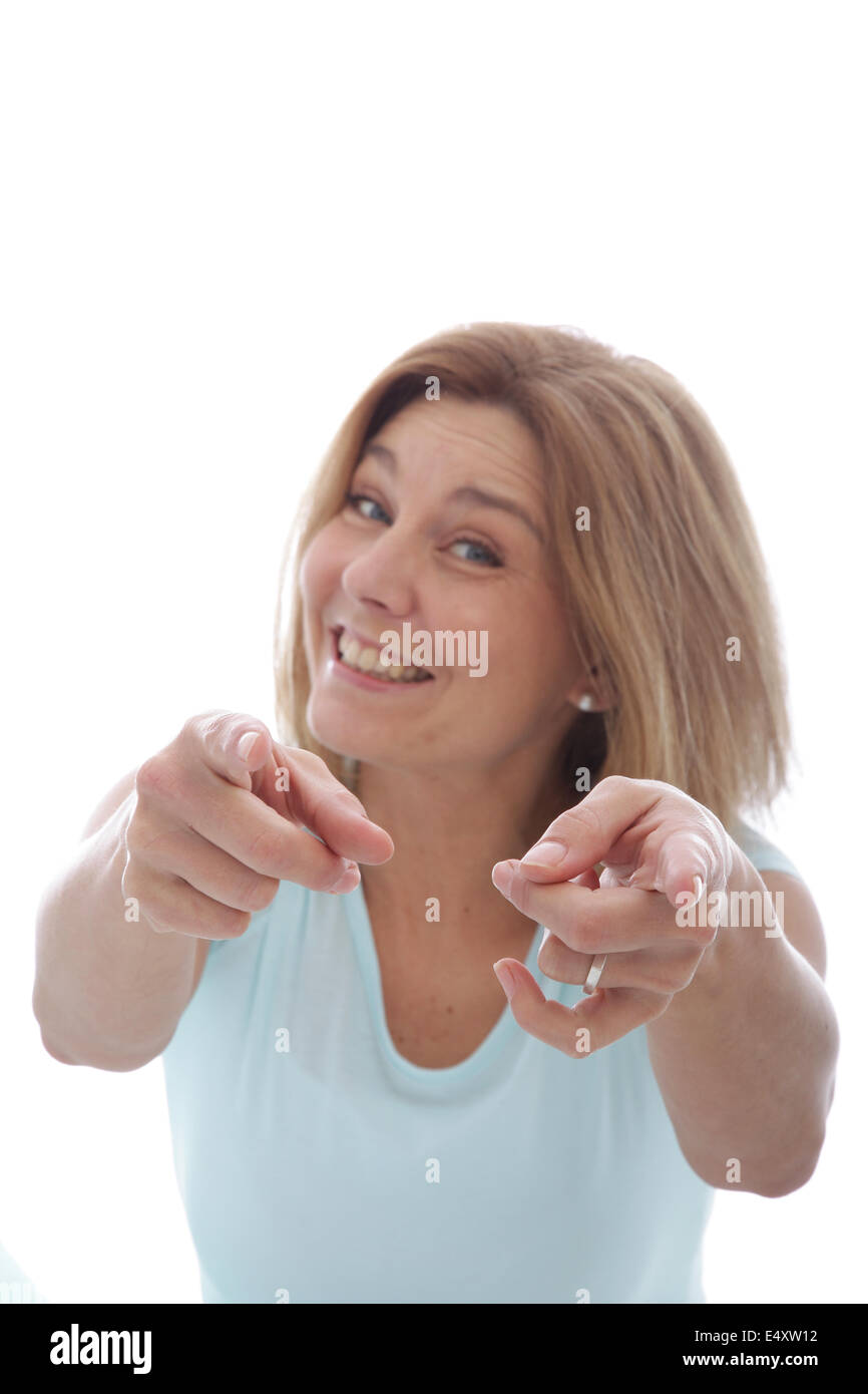 Vivacious woman pointing at the camera Stock Photo - Alamy