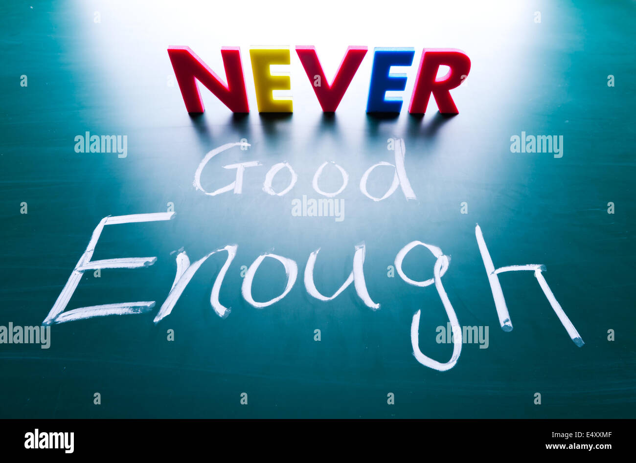 Never good enough concept Stock Photo - Alamy
