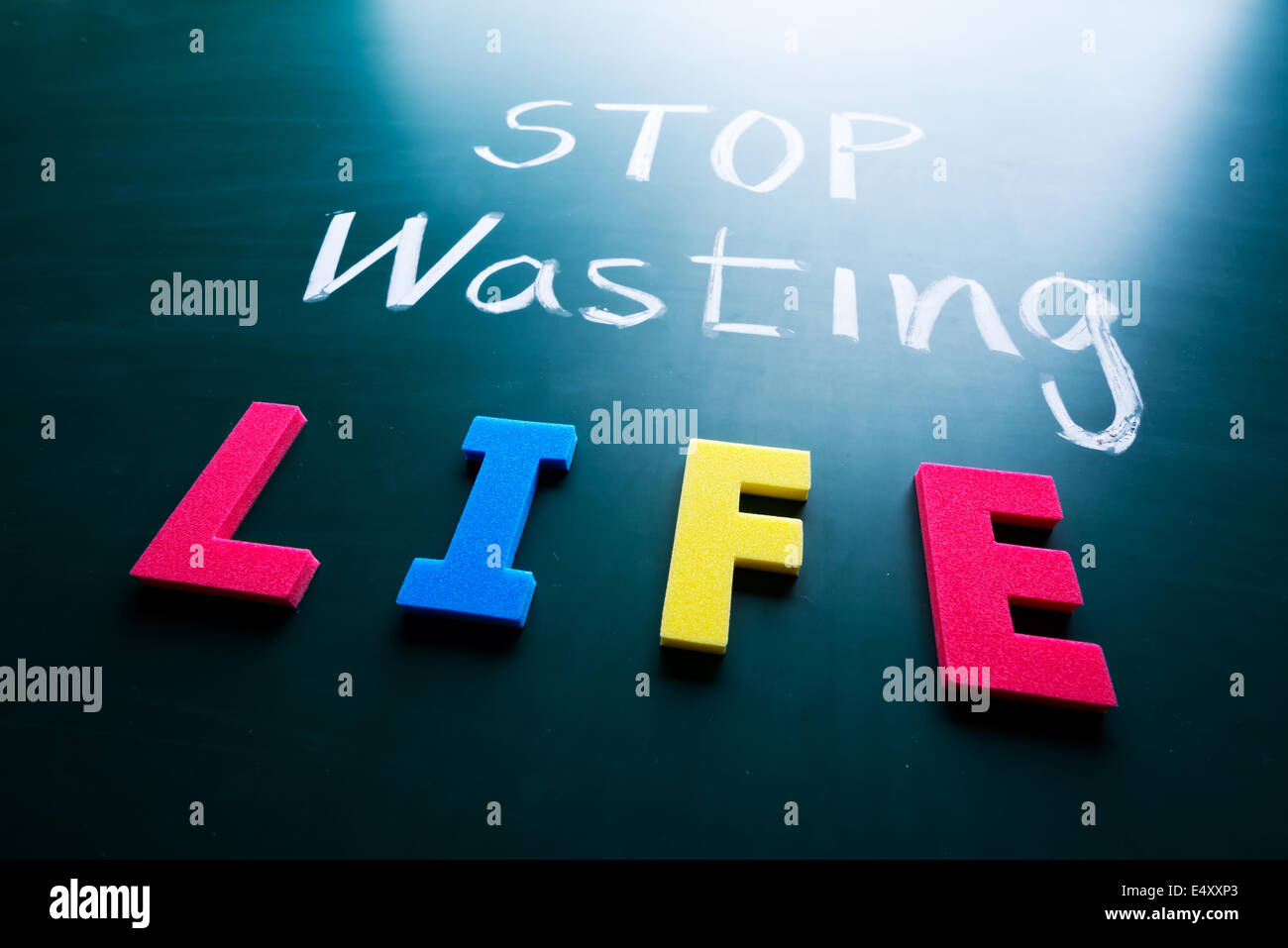 Stop wasting life concept Stock Photo - Alamy