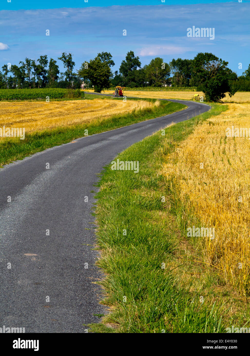 Winding empty rural road near the village of Perignac in south west ...