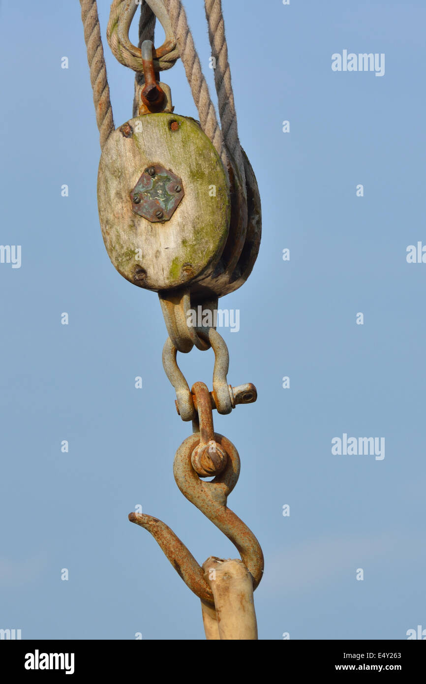 Wooden pulley with Hook Stock Photo - Alamy