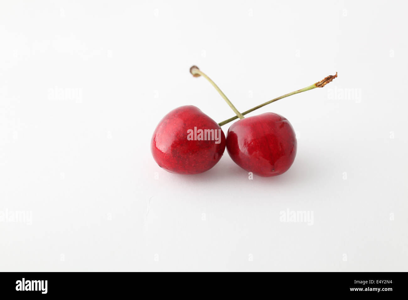 ripe cherry isolated on white background Stock Photo - Alamy