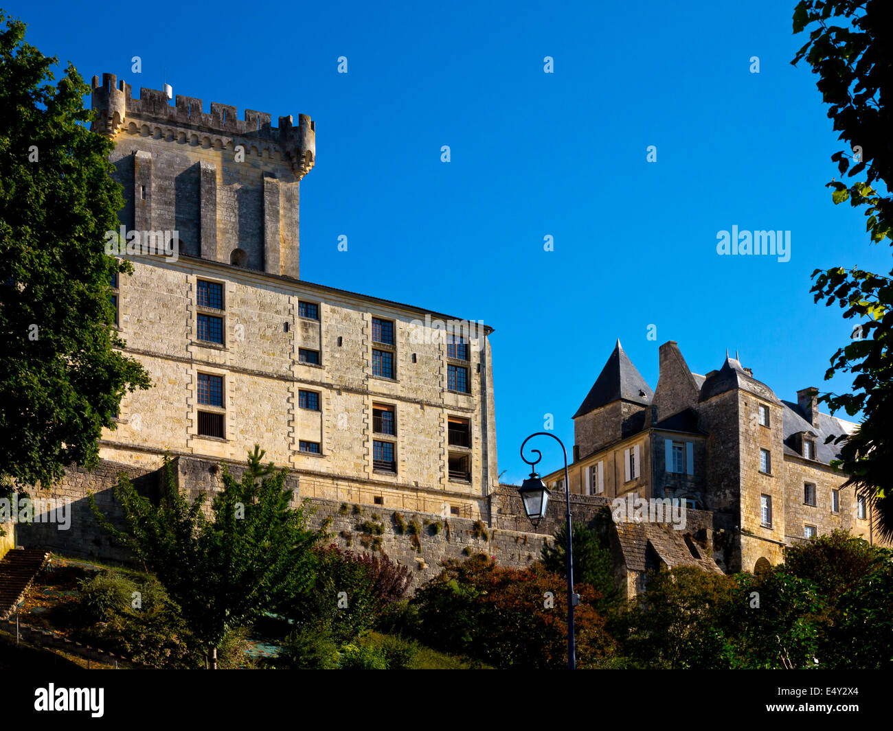 View looking up at the old town and medieval tower or donjon in Pons ...