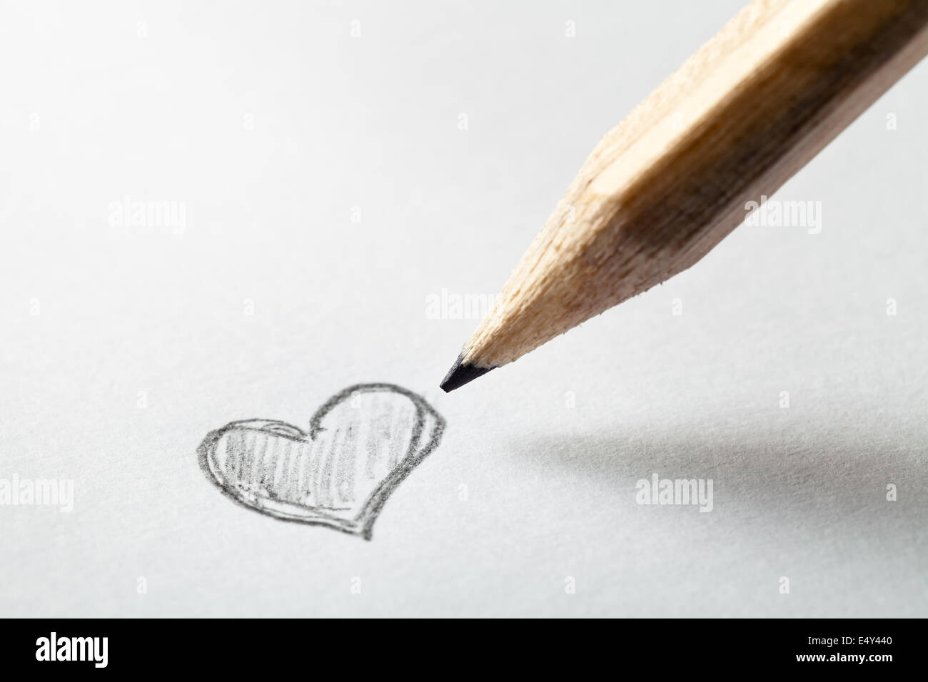 Heart and Pencil Stock Photo - Alamy