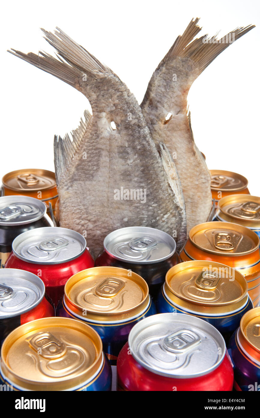 Dried fish and beer on a white background Stock Photo - Alamy