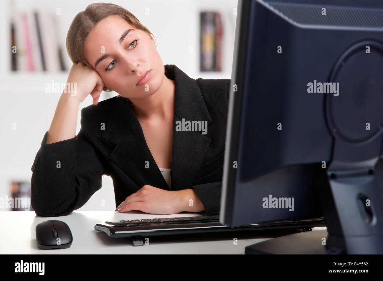 Girl bored at work hi-res stock photography and images - Alamy