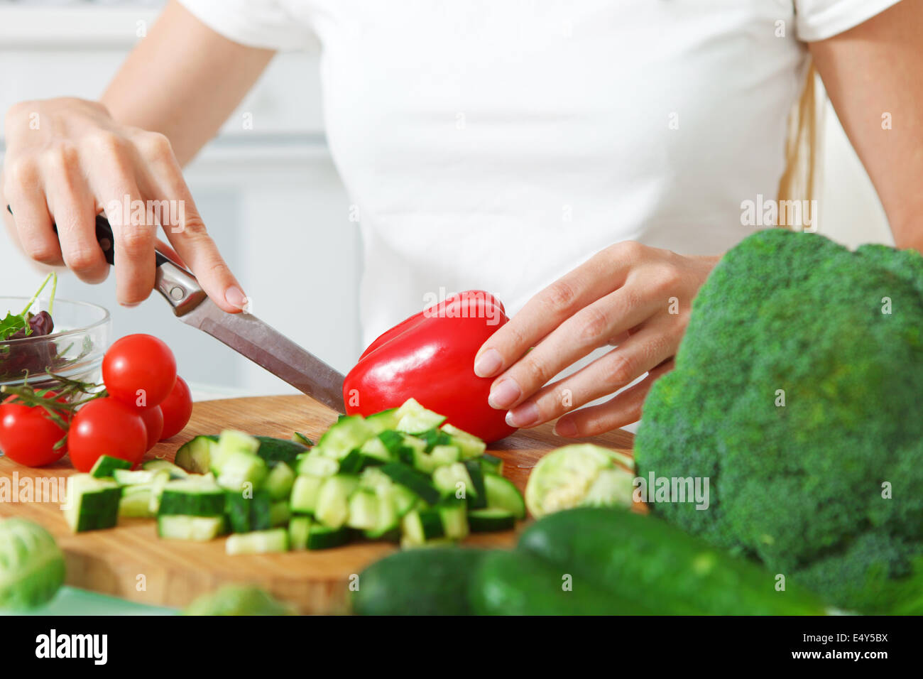 Woman's hands cutting vegetables Stock Photo - Alamy