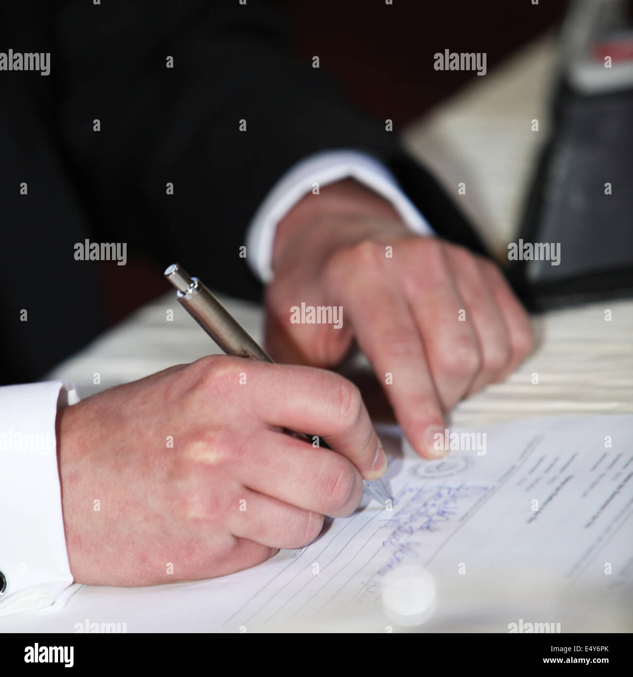 Man completeing a questionnaire Stock Photo - Alamy