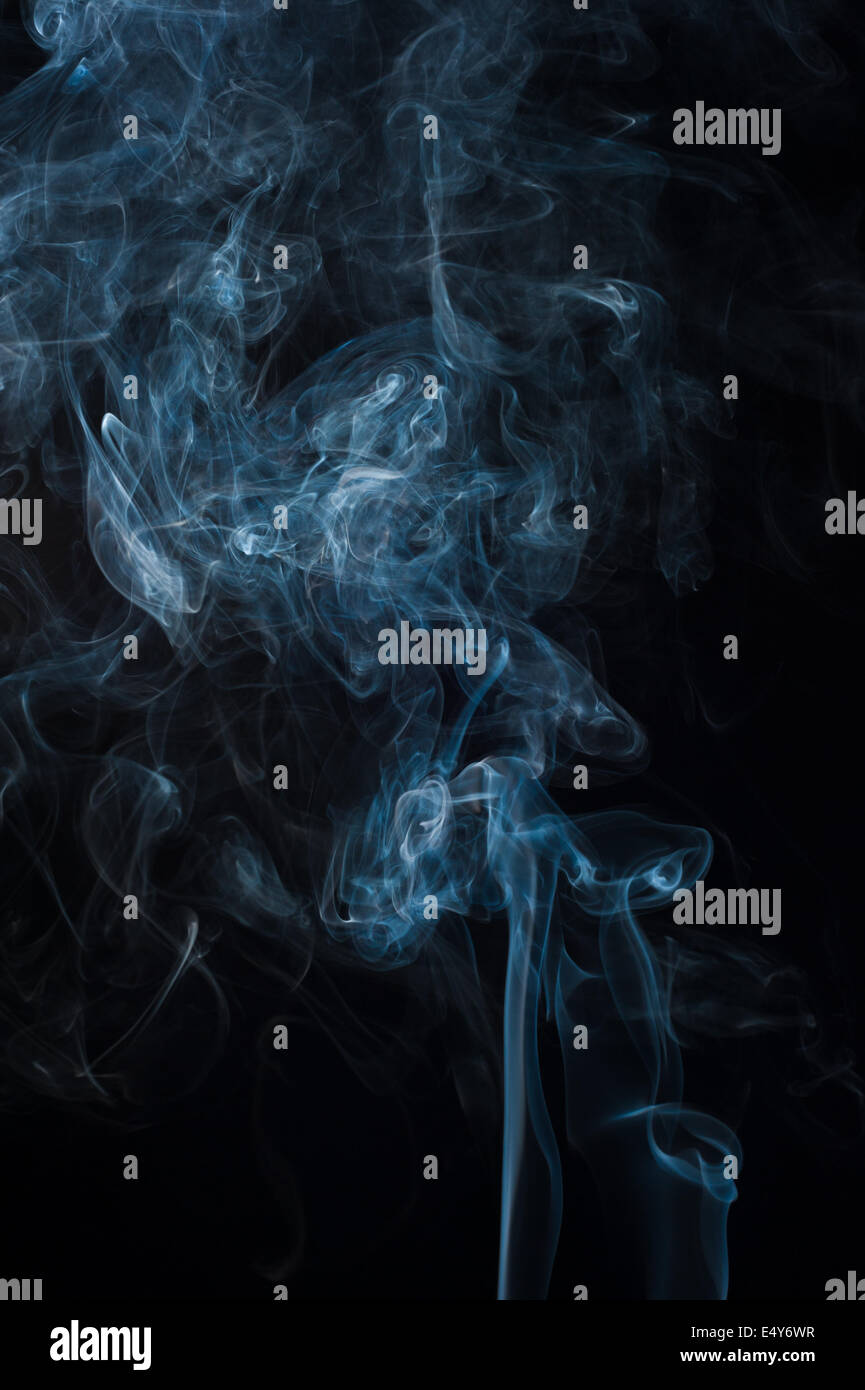 Moving smoke on a black background Stock Photo - Alamy