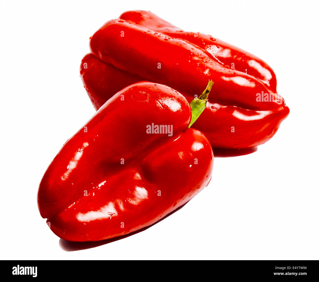 Two red peppers isolated on white Stock Photo - Alamy