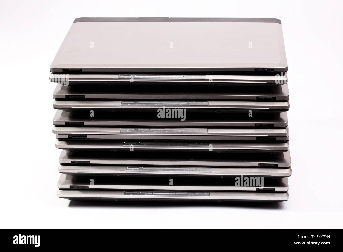 Organized pile of laptops Stock Photo - Alamy