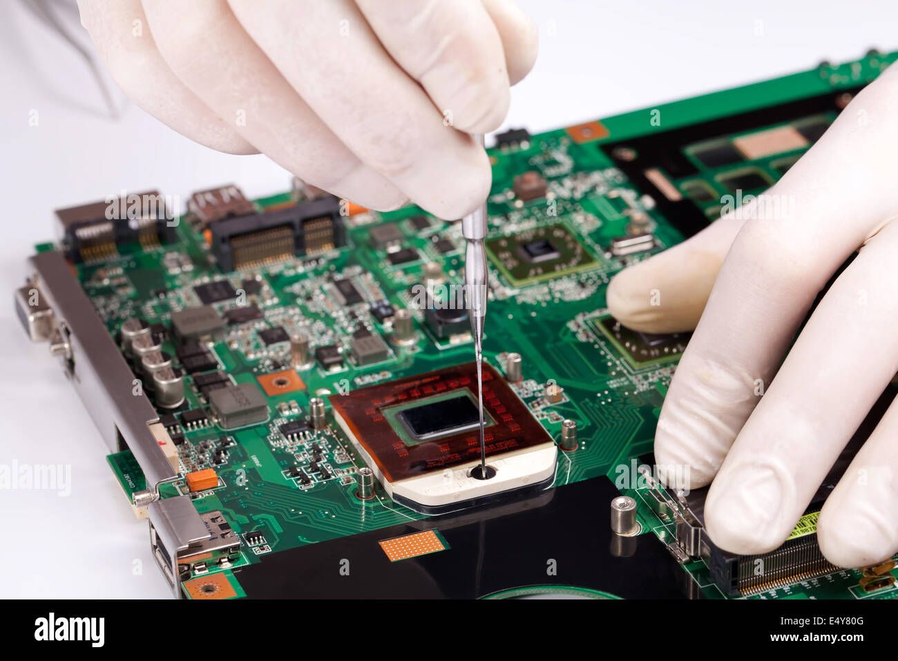 Laptop processor installing Stock Photo - Alamy