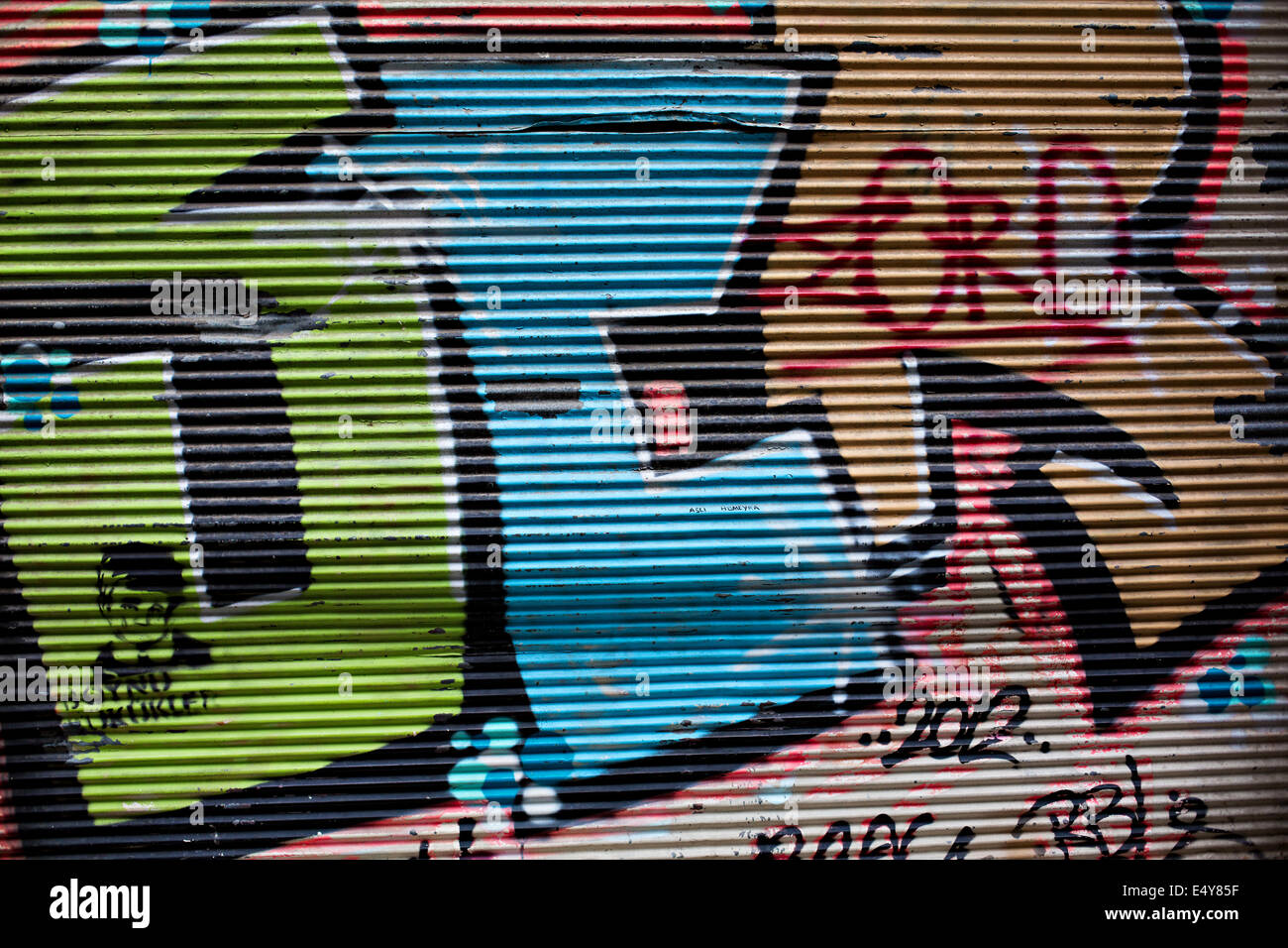 Metal texture with graffiti Stock Photo - Alamy