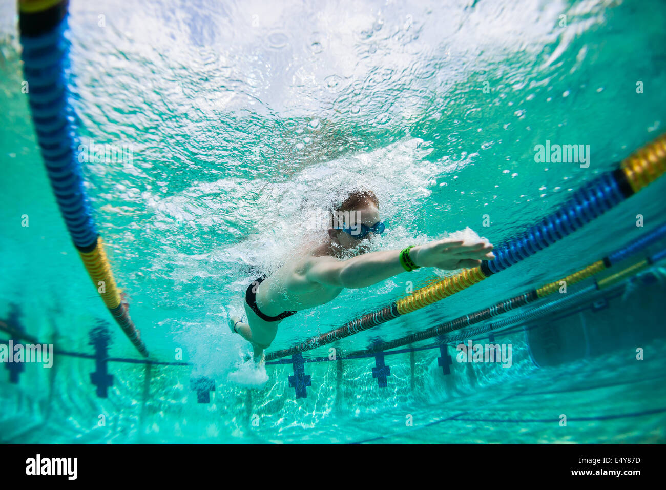 Boy teenager swimming training underwater photo closeup action Stock ...