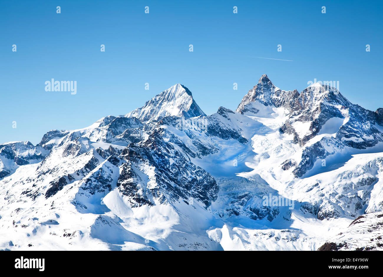 Alpine hills in snow in February Stock Photo - Alamy