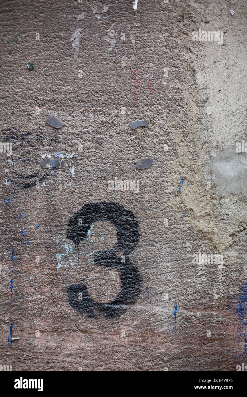 Stone wall texture with graffiti Stock Photo - Alamy