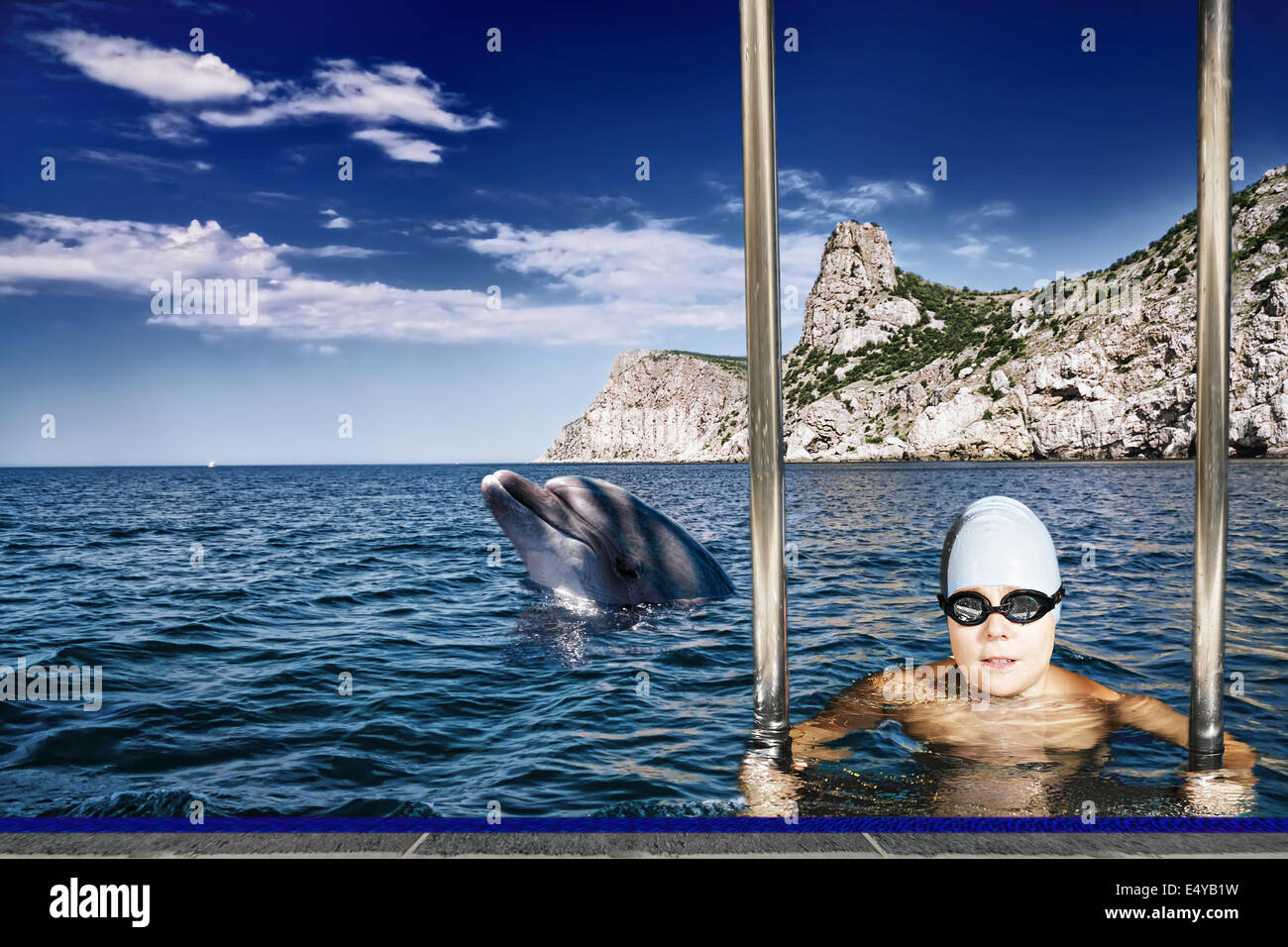 Boy and dolphin Stock Photo - Alamy