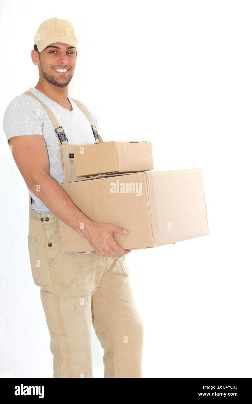 Young delivery man carrying hi-res stock photography and images - Alamy