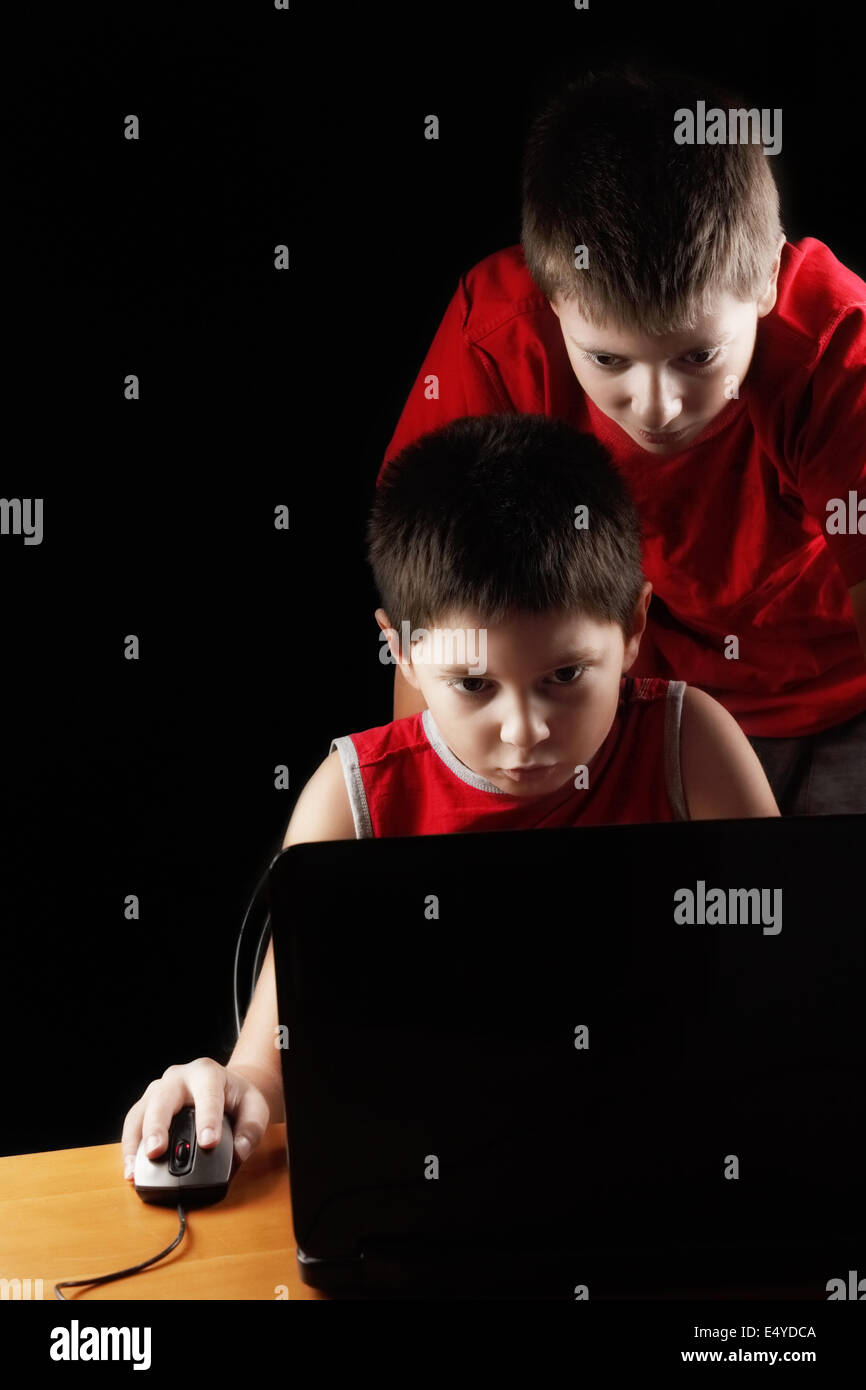 Boys with computer hi-res stock photography and images - Alamy