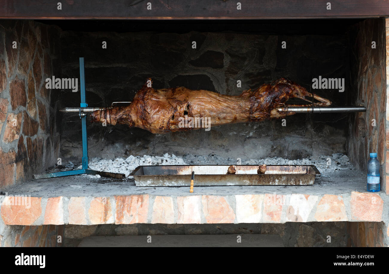 Spit roast lamb hi-res stock photography and images - Alamy