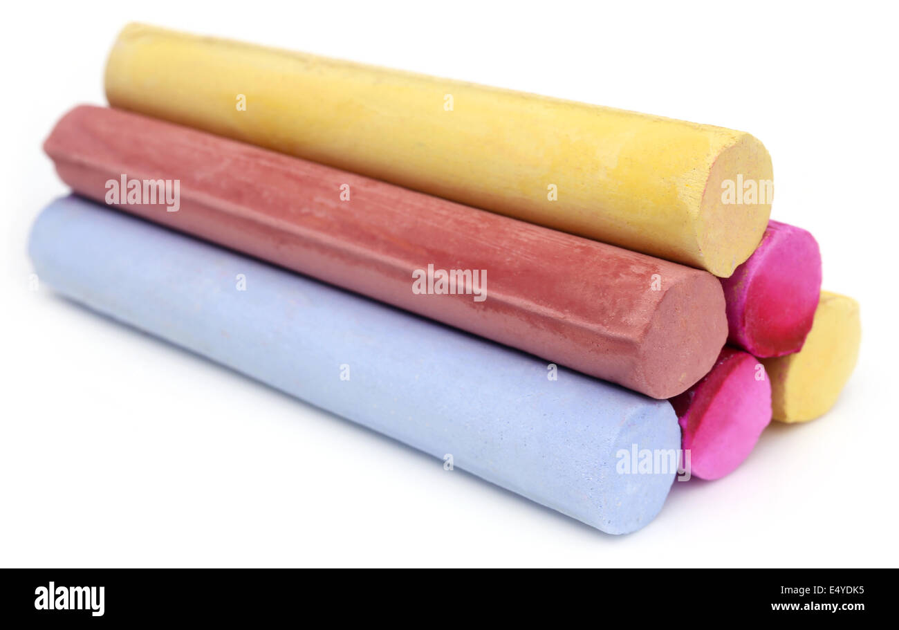 Colorful chalks over white background Stock Photo - Alamy