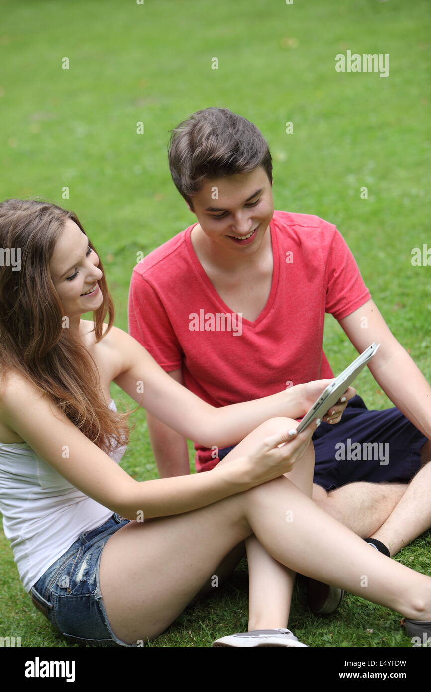 Girl and boy smiling hi-res stock photography and images - Alamy