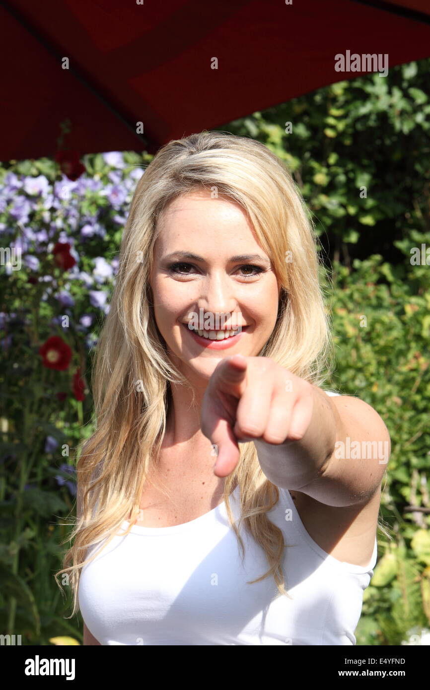 Woman points camera hi-res stock photography and images - Alamy