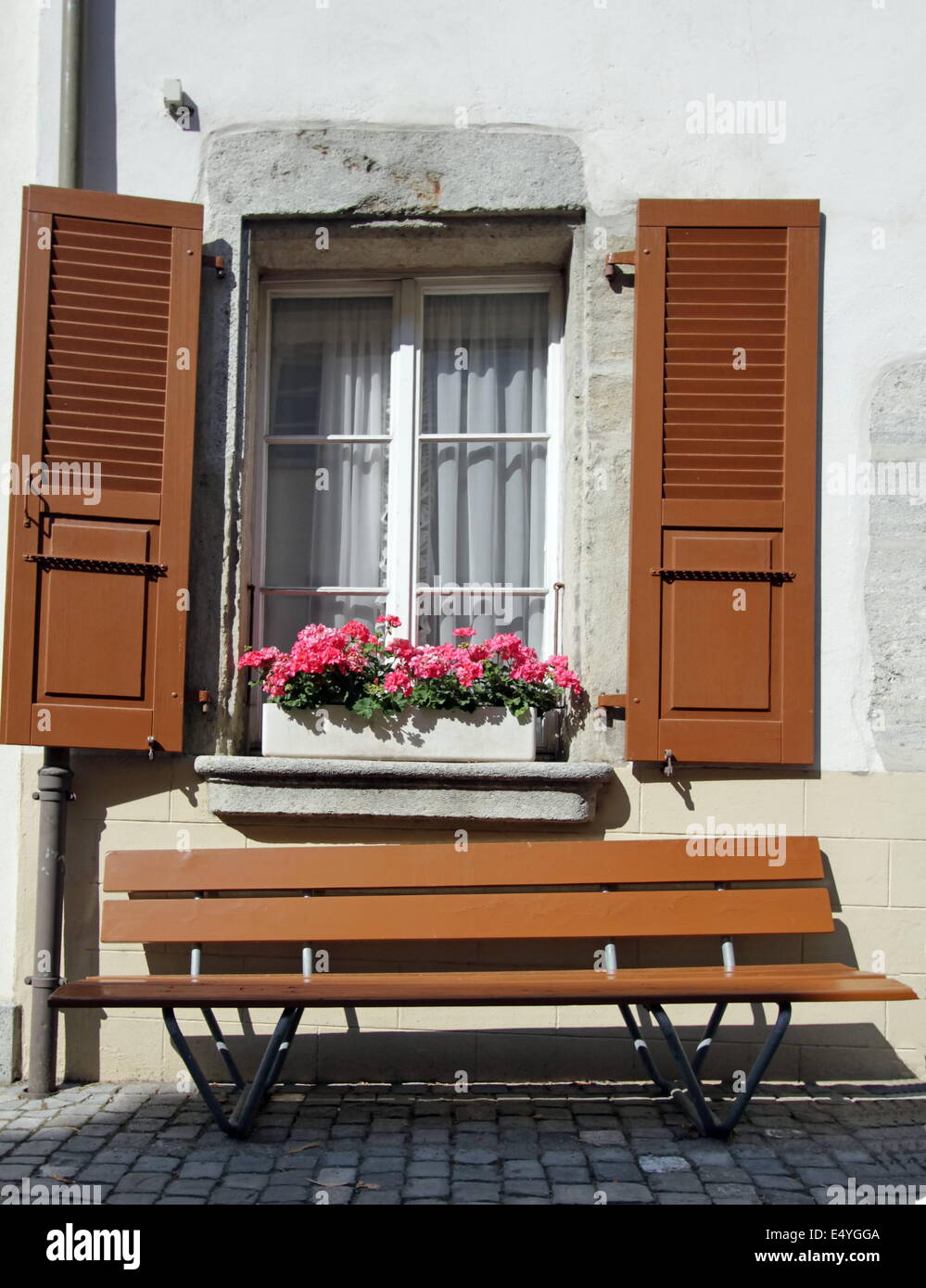 Bench at the window Stock Photo - Alamy