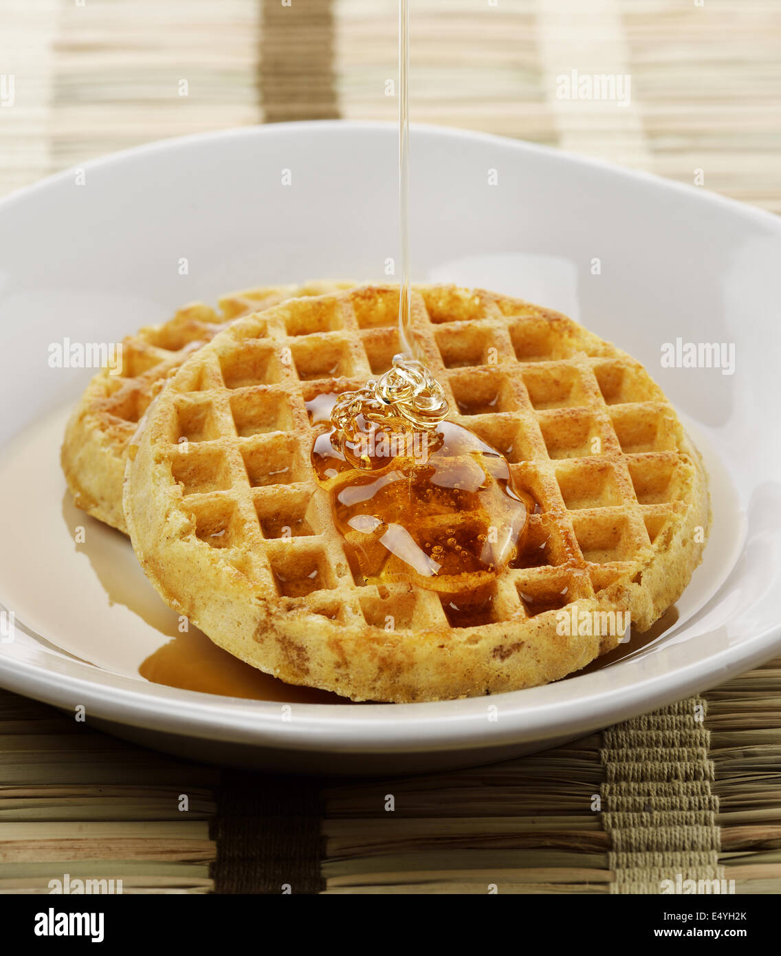 Waffles With Maple Syrup Stock Photo - Alamy