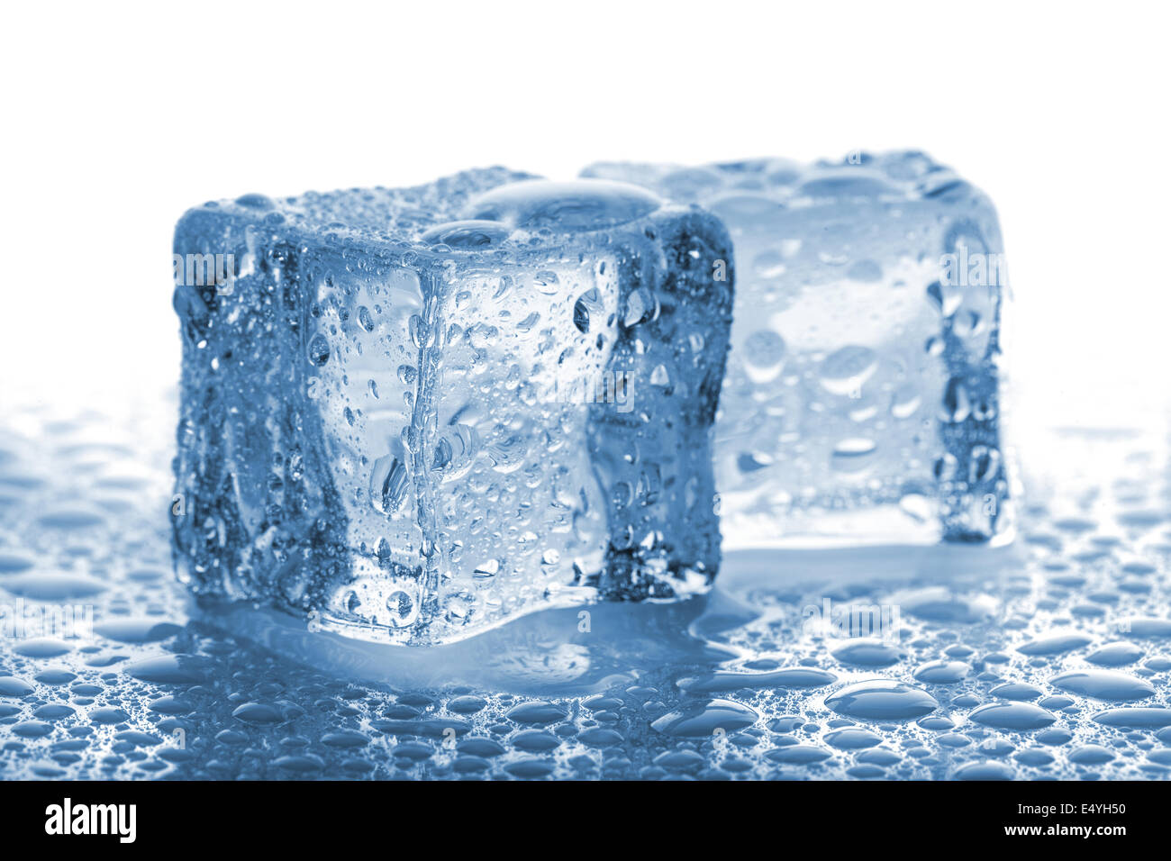 Pair of melted ice cubes Stock Photo - Alamy