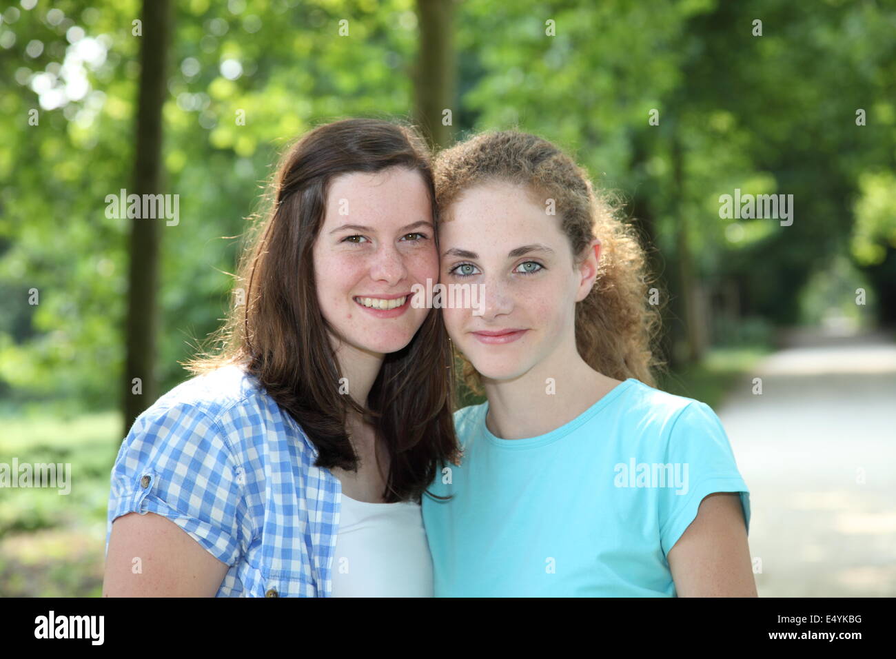 Two smiling teenage friends Stock Photo - Alamy