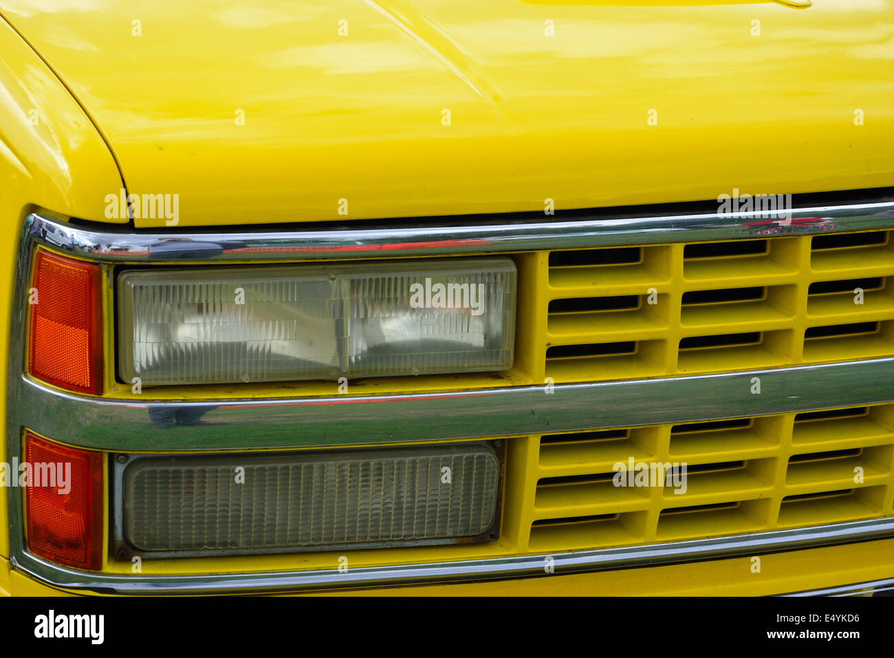 Yellow car front Stock Photo - Alamy