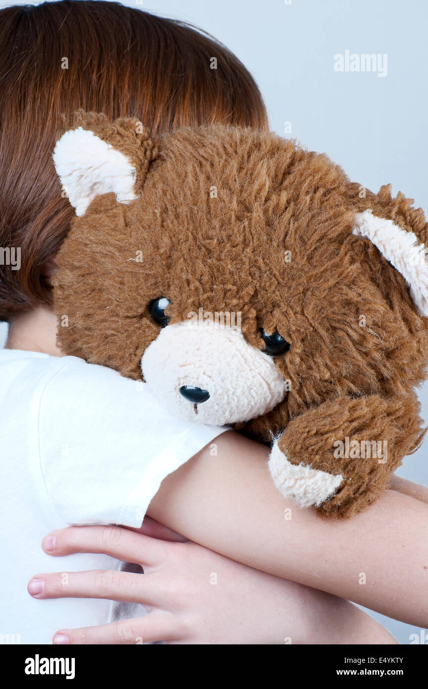 Picture of a young with freckles playing games Stock Photo - Alamy