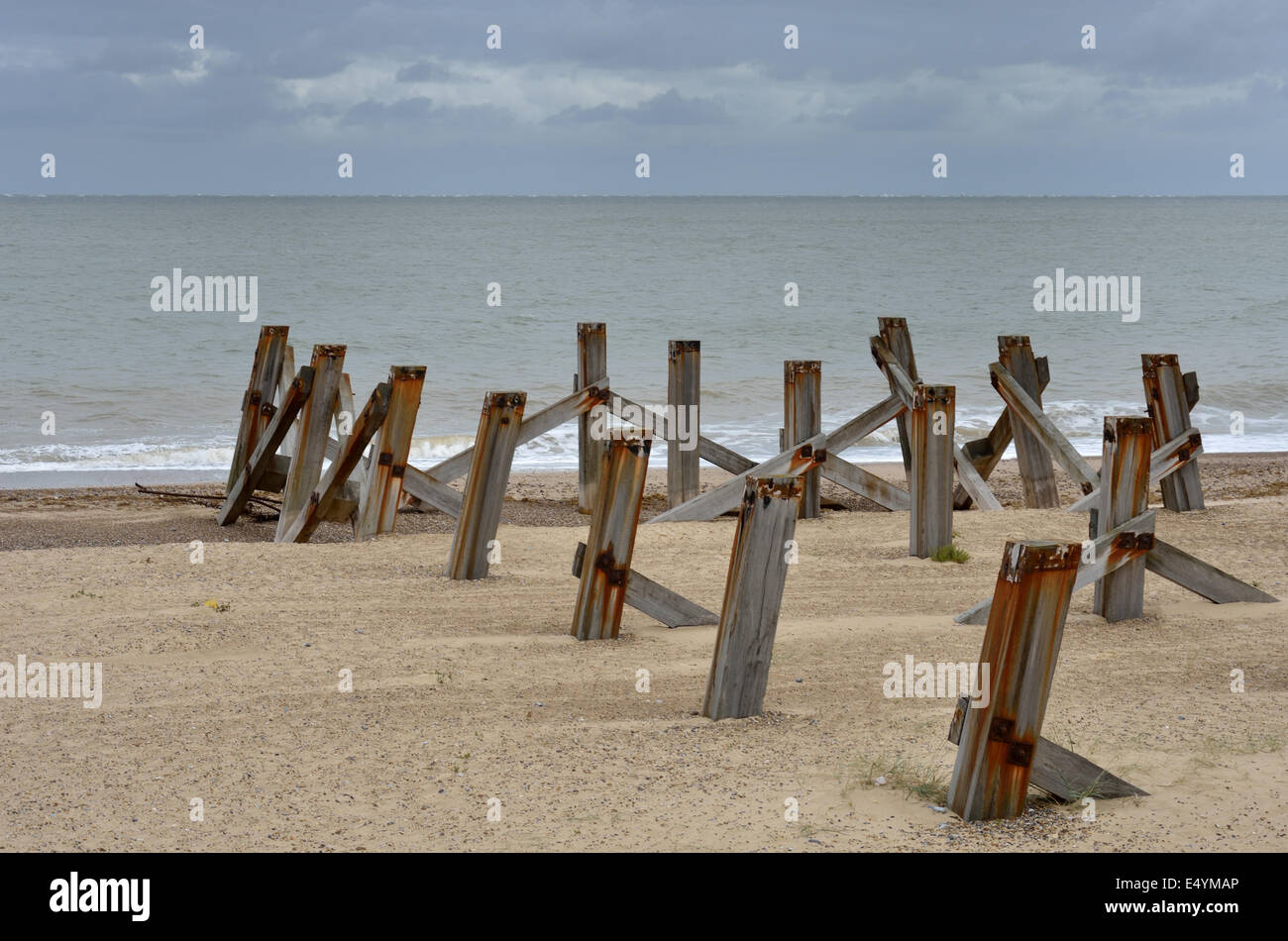 Posts on beach Stock Photo - Alamy
