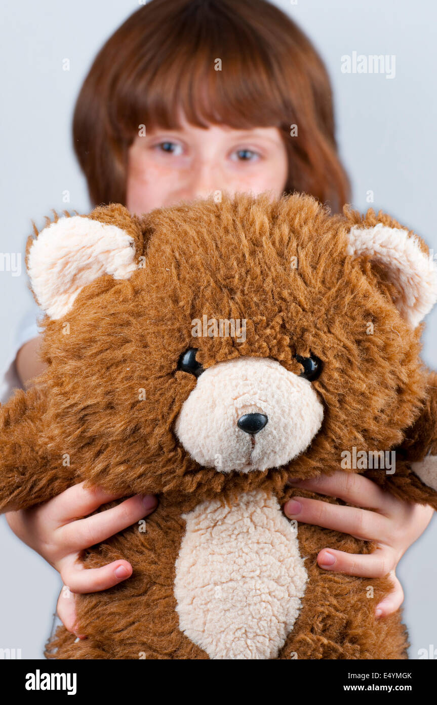 Picture of a young with freckles playing games Stock Photo - Alamy