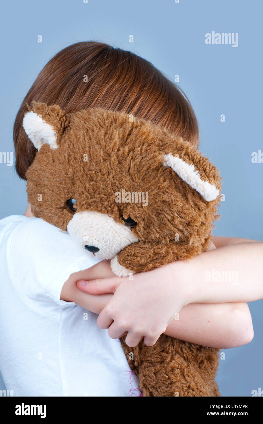 Picture of a young with freckles playing games Stock Photo - Alamy