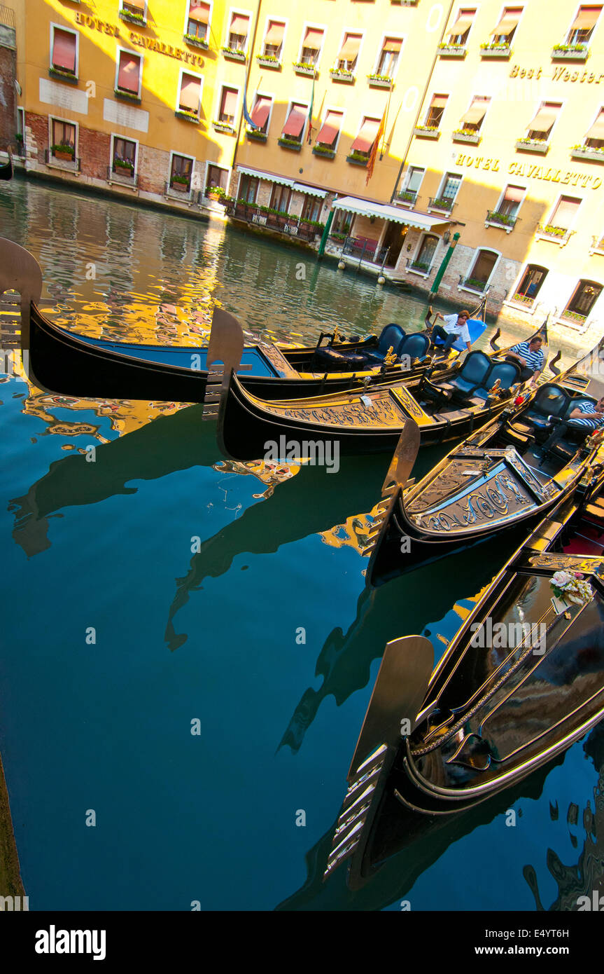 Venetian gondolas on the canal hi-res stock photography and images - Alamy