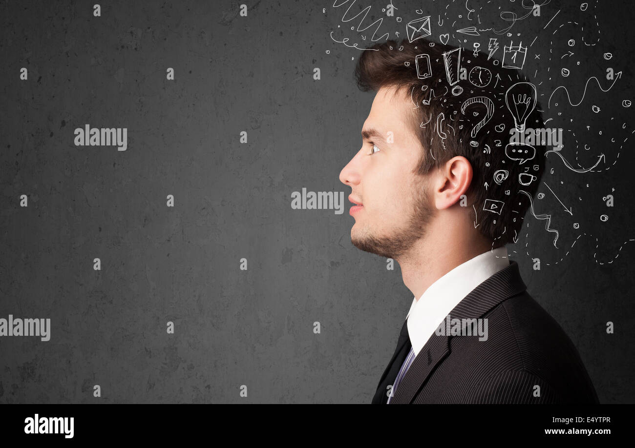 Young man thinking with abstract lines and symbols Stock Photo - Alamy